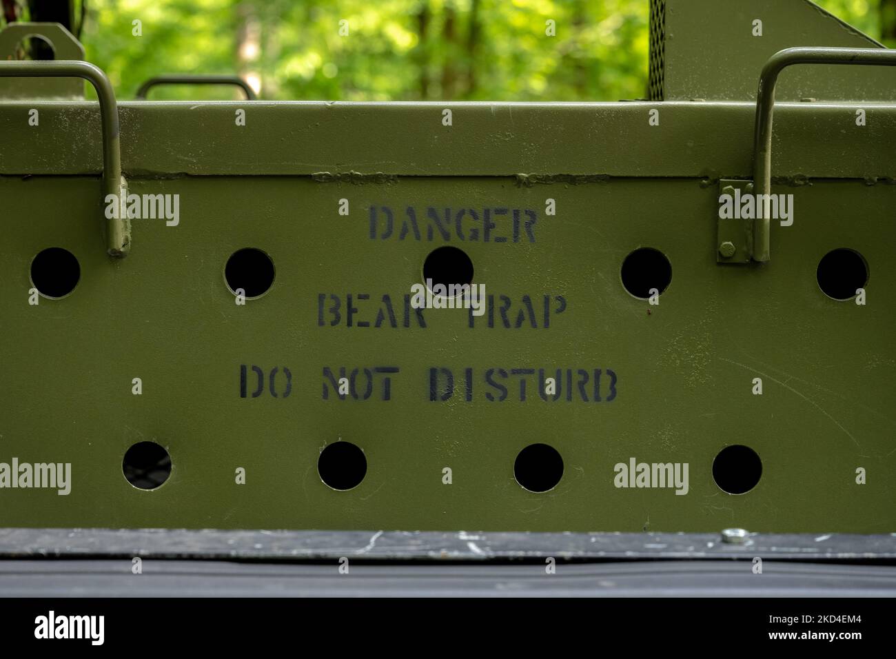 Danger Bear Trap Do Not Disturb Spray Painted On Green Metal Box on ...
