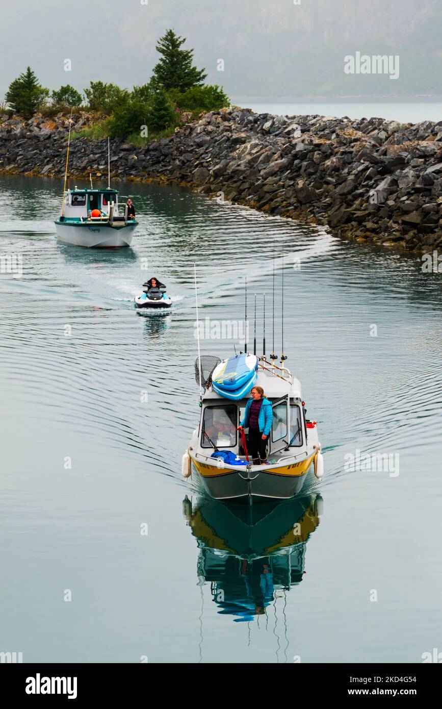 Female captain of commercial fishing fishing boat returns to harbor ...