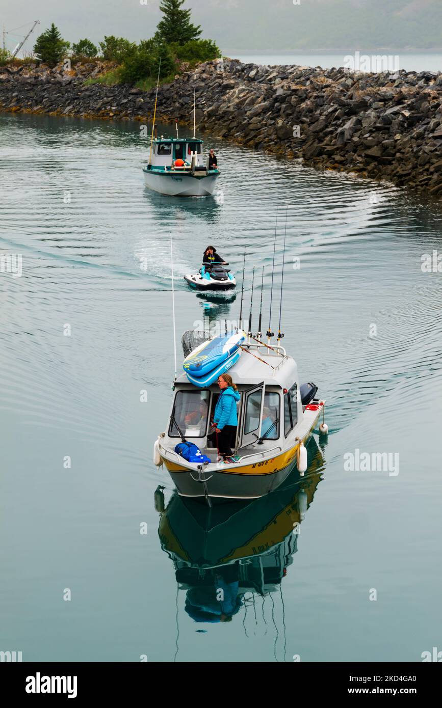 Female captain of commercial fishing fishing boat returns to harbor ...