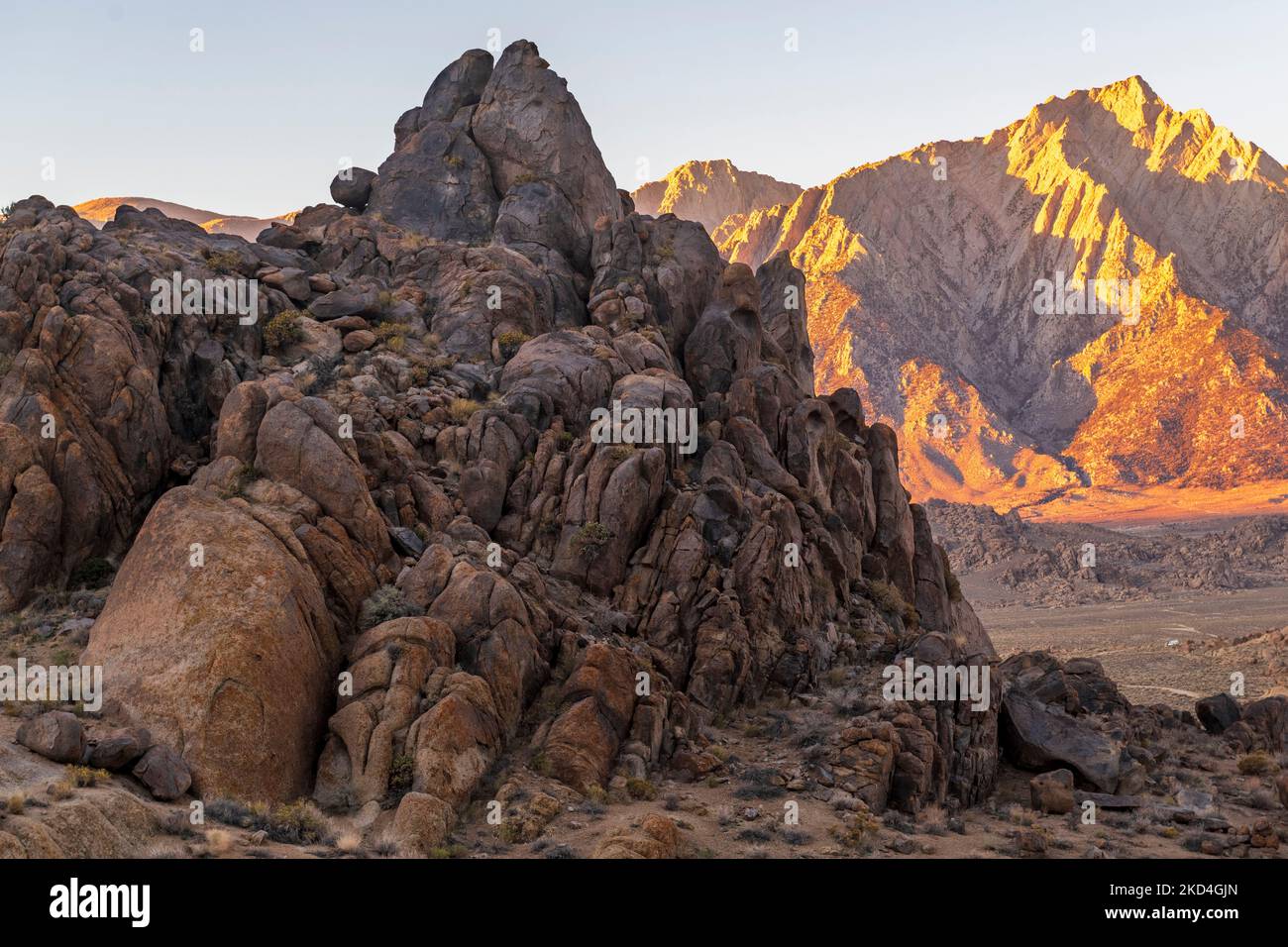 Ancient rock formations of Alabama Hills in foreground with desert ...