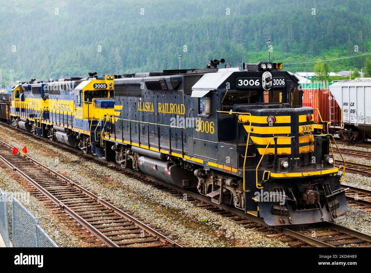 Alaska Railroad depot and locomotive train; Whittier, Alaska, USA. A ...