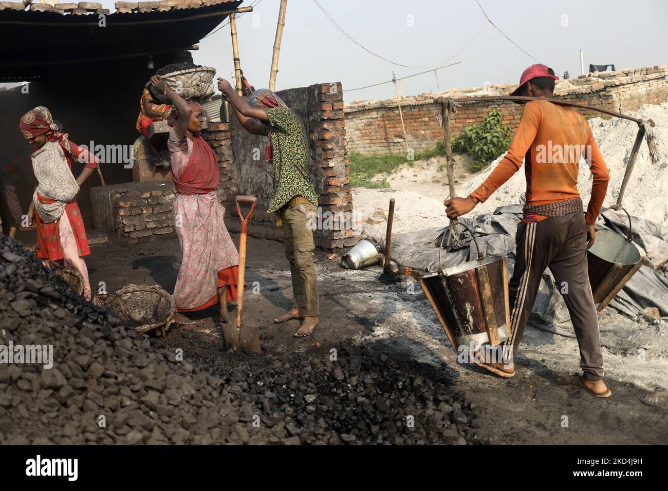 Seasonal Migrant workers during work at a brick-making field at ...