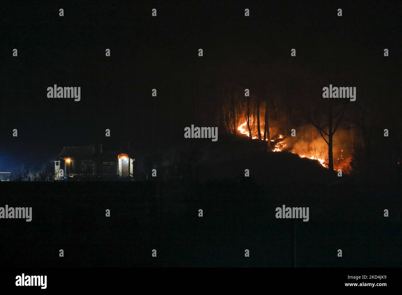 A wildfire burns in the eastern city of Uljin. The fire started in the ...