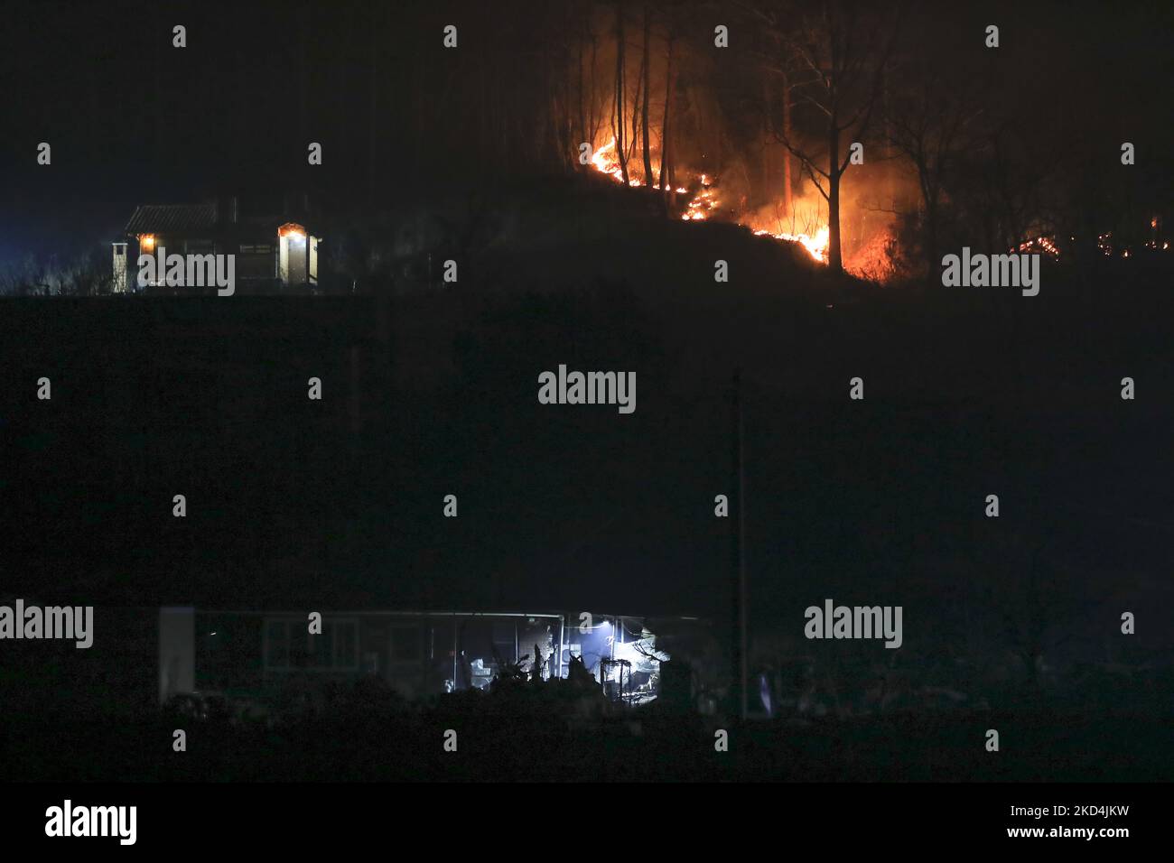 A wildfire burns in the eastern city of Uljin. The fire started in the ...