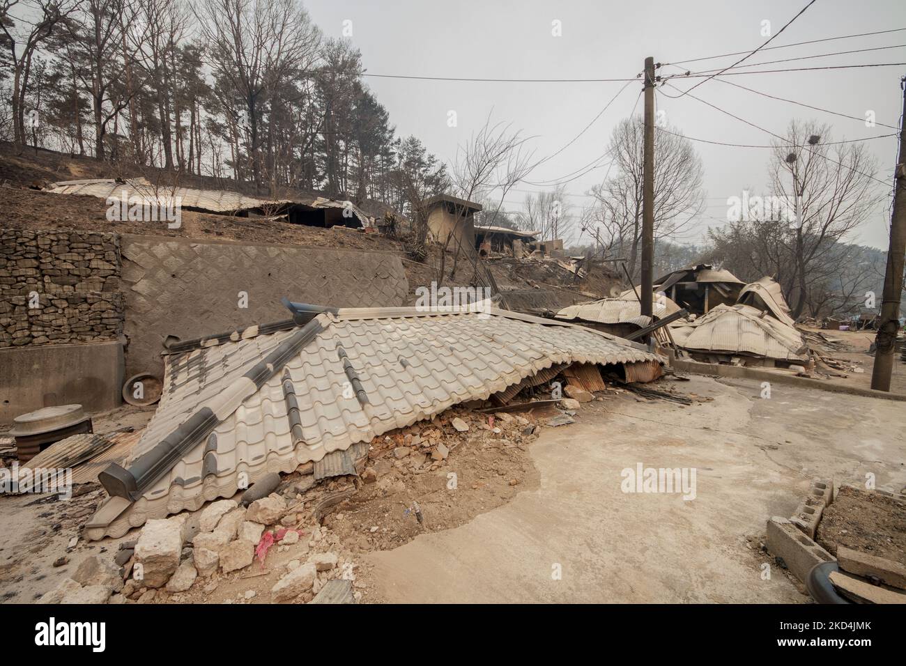 A wildfire burns in the eastern city of Uljin. The fire started in the ...