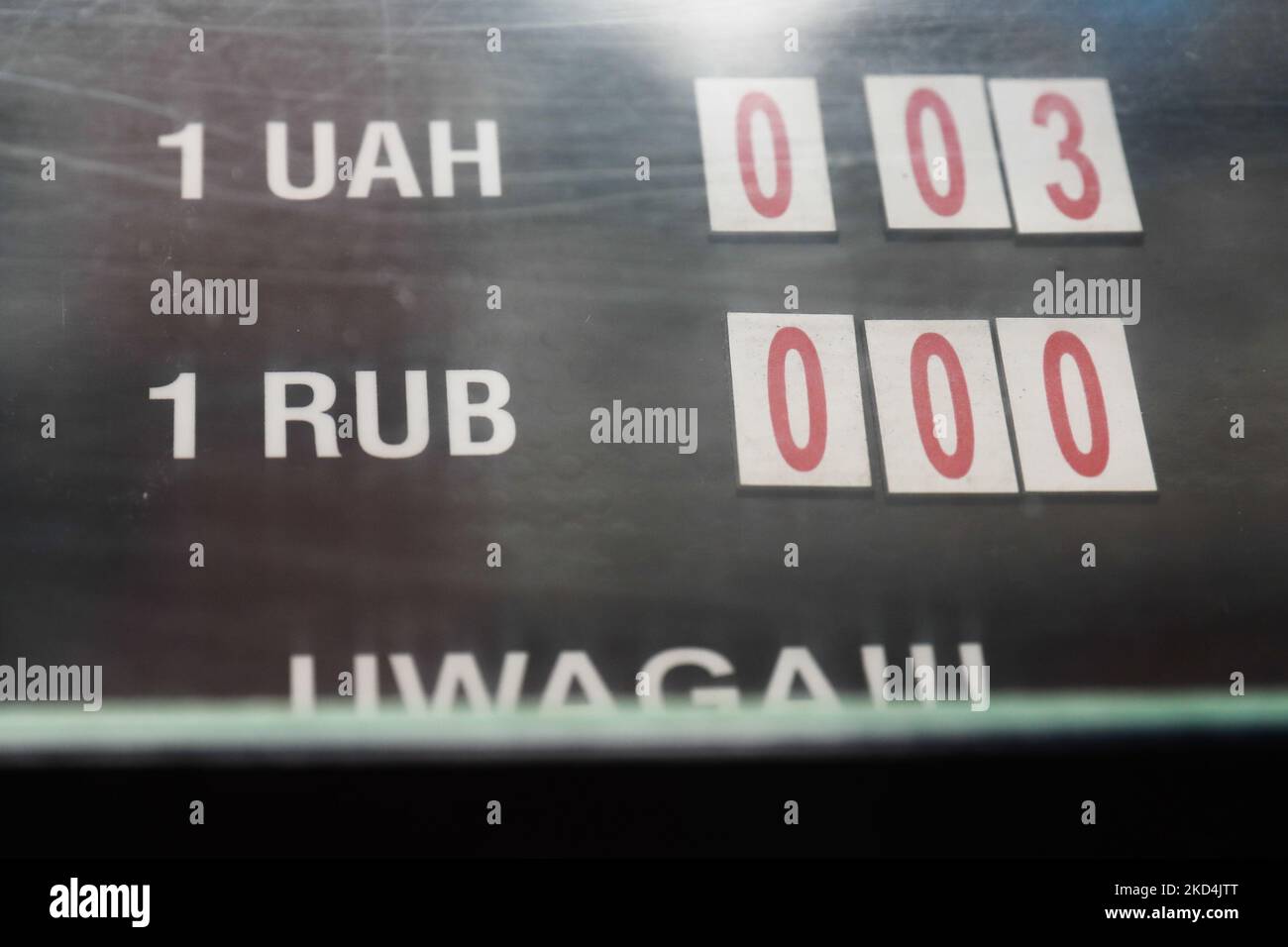 Ukrainian hryvnia and Russian ruble prices are seen on the board in the ...