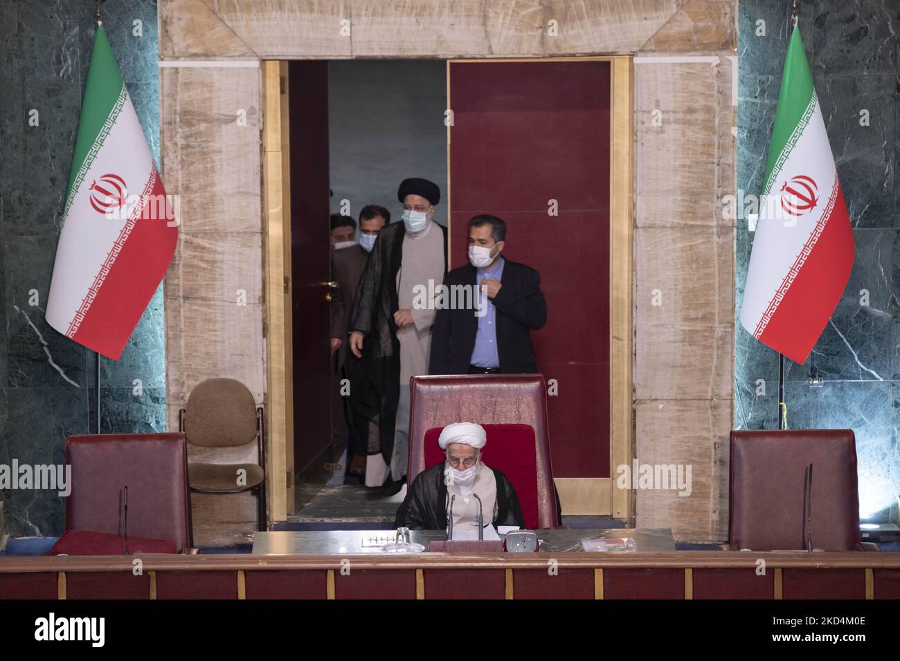 Iranian President Ebrahim Raisi (C) arrives the old Iranian Parliament ...