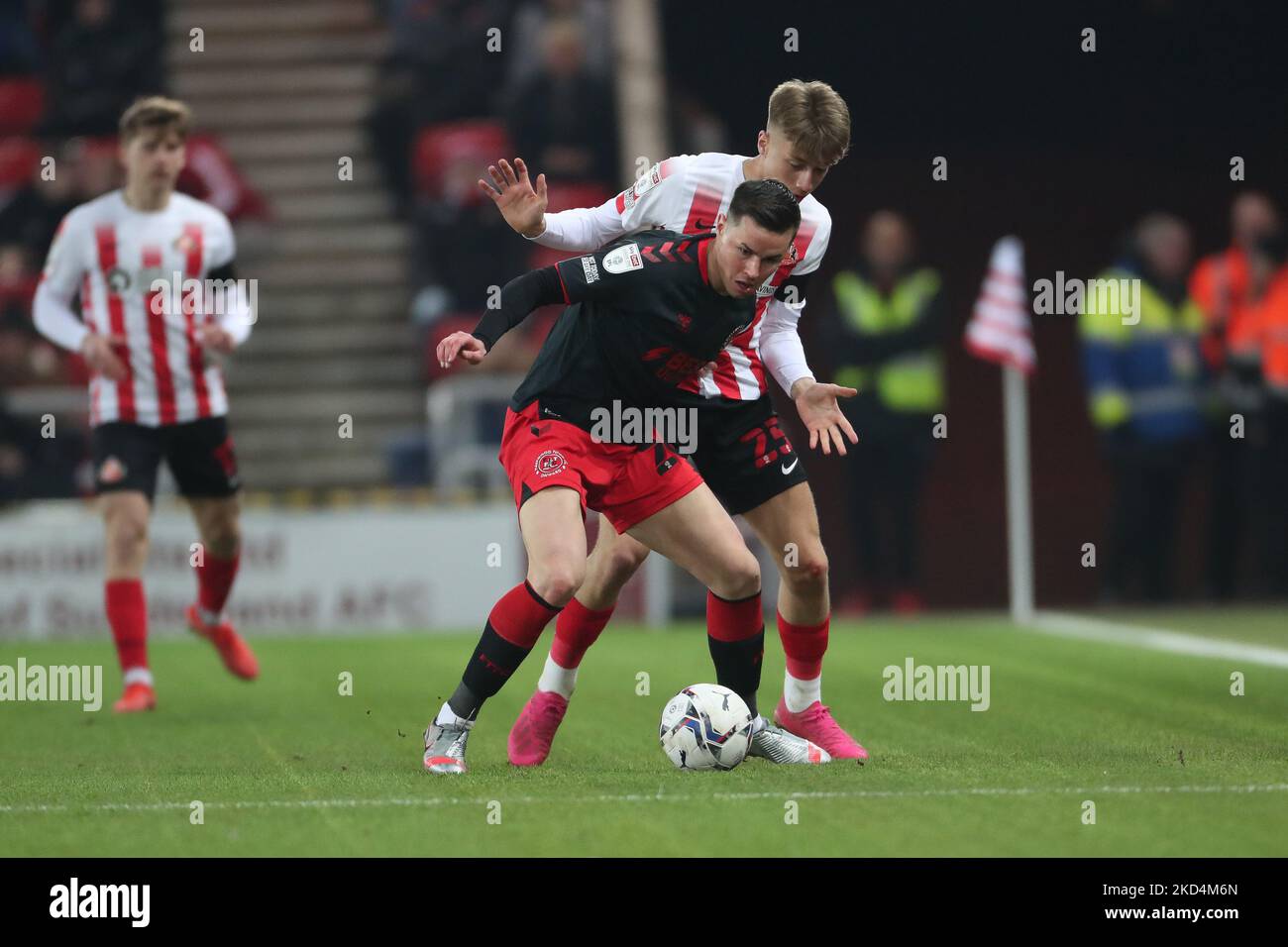 Sunderland's Jack Clarke battles for possession with Fleetwood Town's ...
