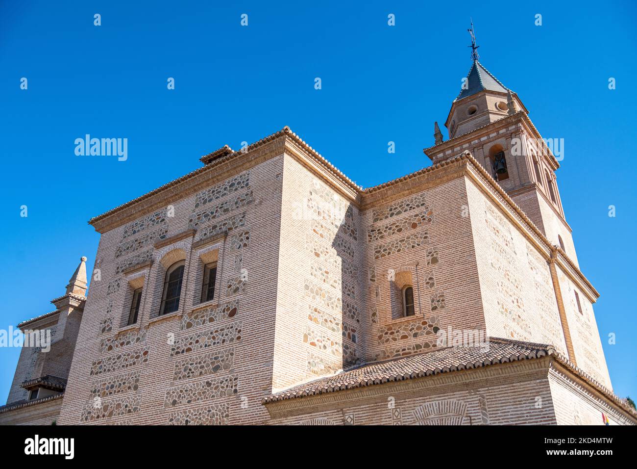 The exterior facade of a building in the Alhambra Palace complex in ...