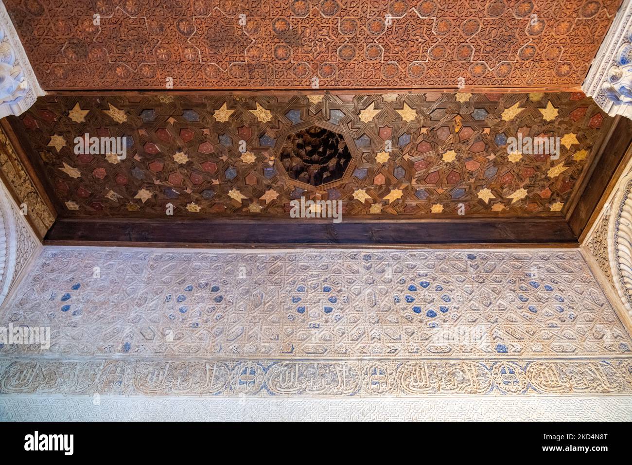 Calligraphy carvings on a ceiling at the Alhambra Palace complex in ...