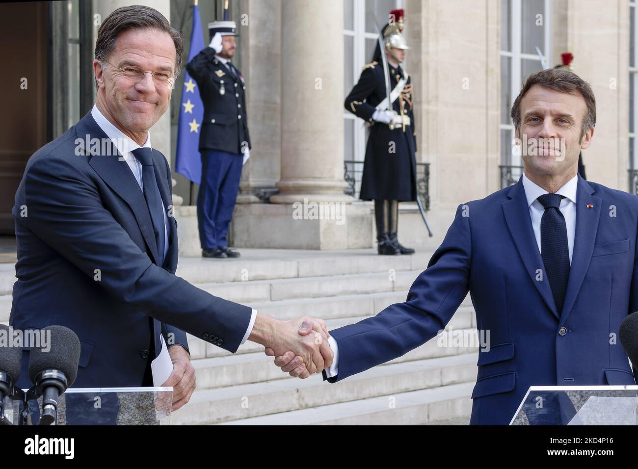 France's President Emmanuel Macron welcomes the Prime Minister of the ...