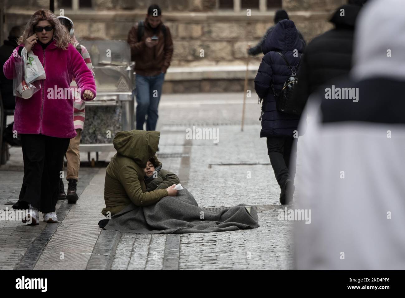 A homeless at Ermou street in the center of Athens, Greece on March 10 ...
