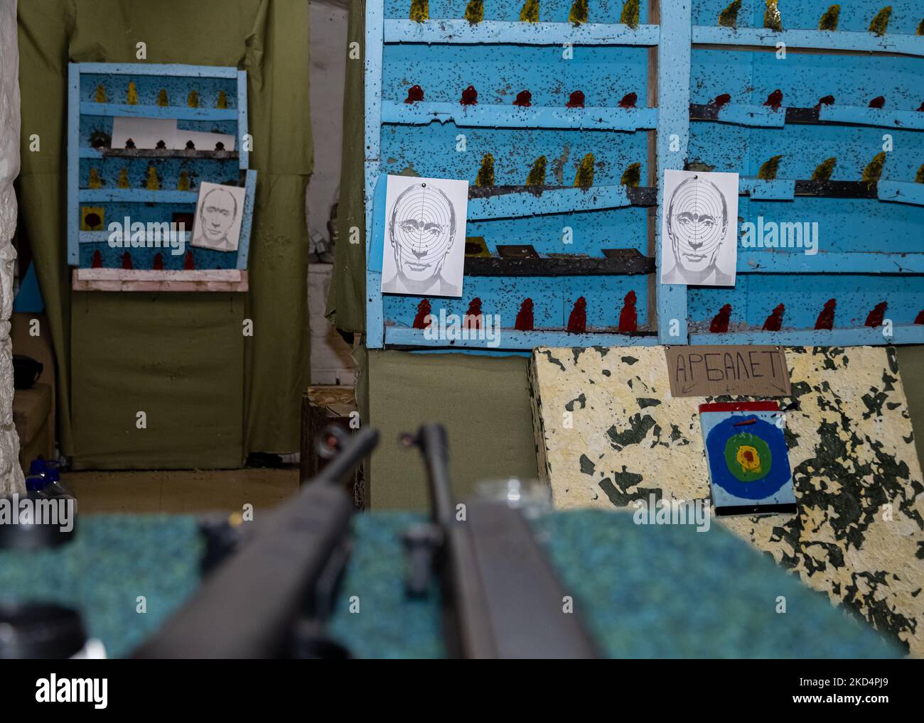 A shooting arcade in Lviv, Ukraine, on March 8, 2022. Patrons, armed ...