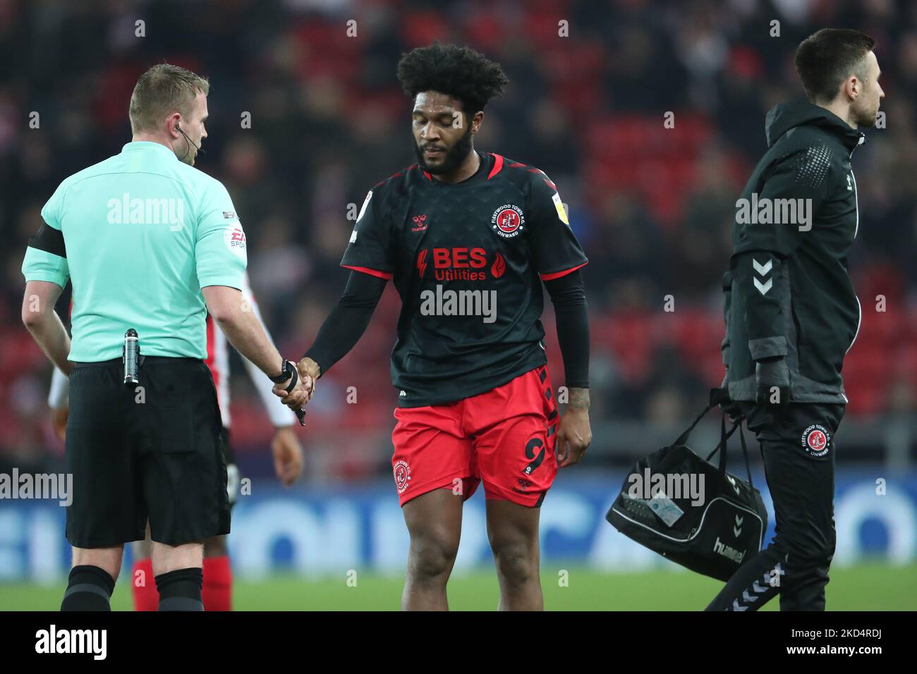 Fleetwood Town's Ellis Harrison shakes hands with referee Samuel ...