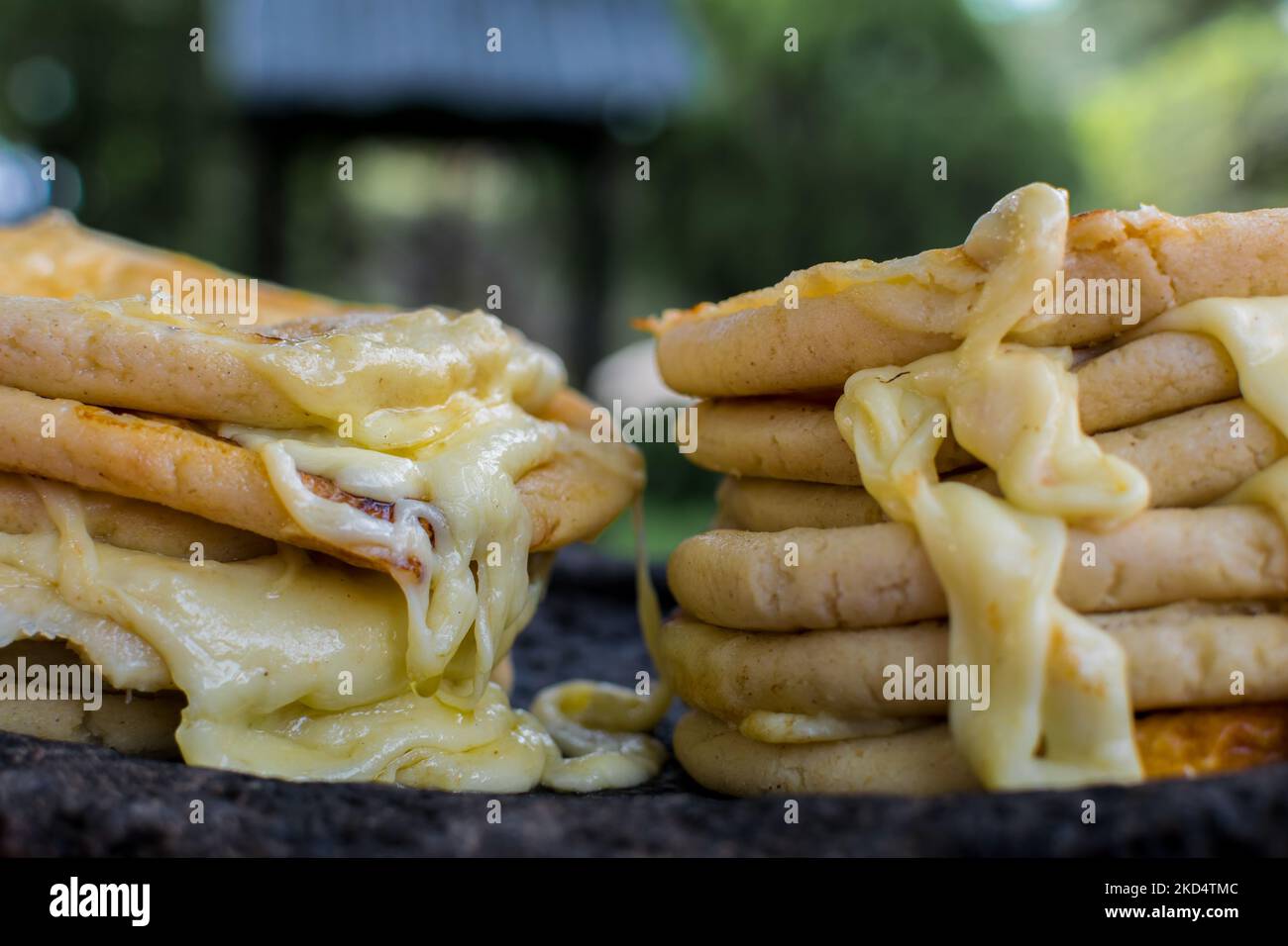 typical Salvadoran dish, cheese pupusas with cabbage and tomato sauce ...