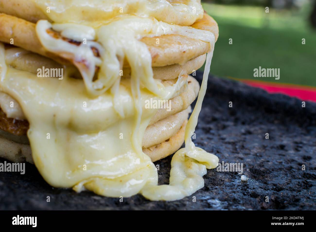 typical Salvadoran dish, cheese pupusas with cabbage and tomato sauce ...