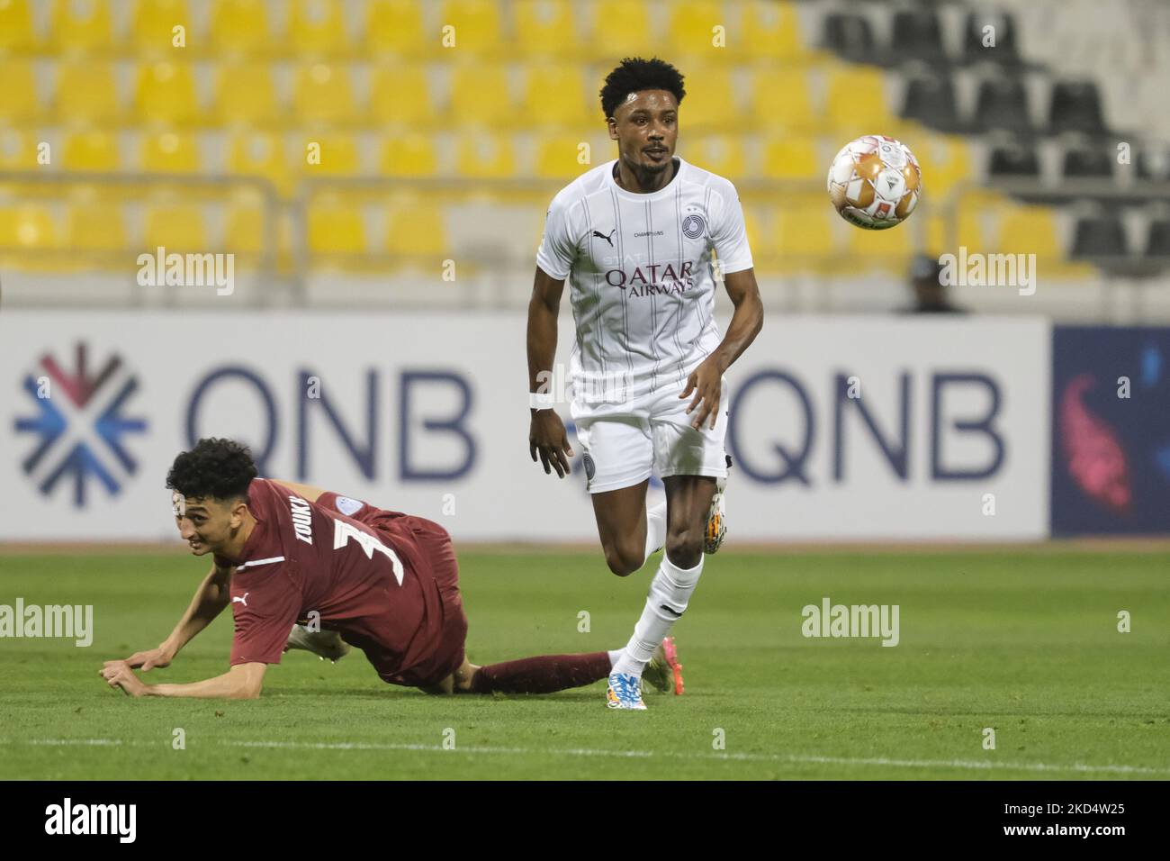 Musab Kheder (70) of Al Sadd on the ball Musab Kheder during the QNB ...
