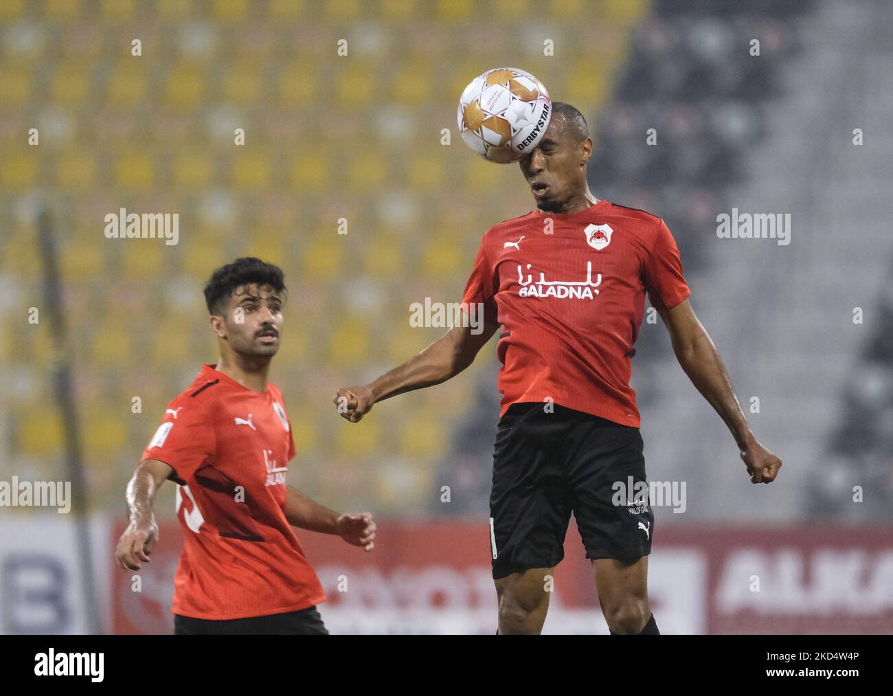 Mohammad Jumaa Mubarak Al Alawi (21) of Al Rayyan wins a header during ...