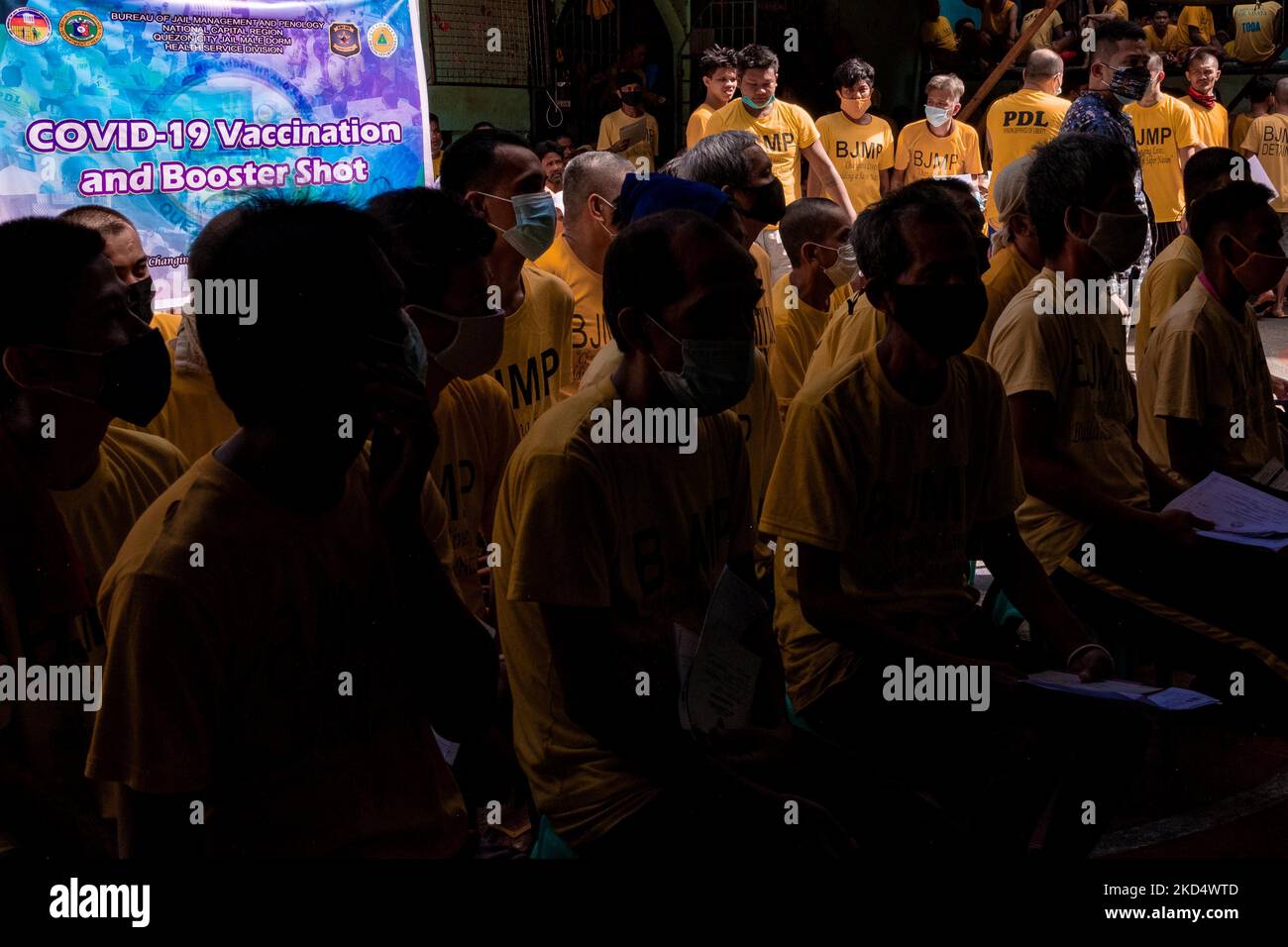 Filipino inmates wait to get their shots of AstraZeneca’s COVID19 ...