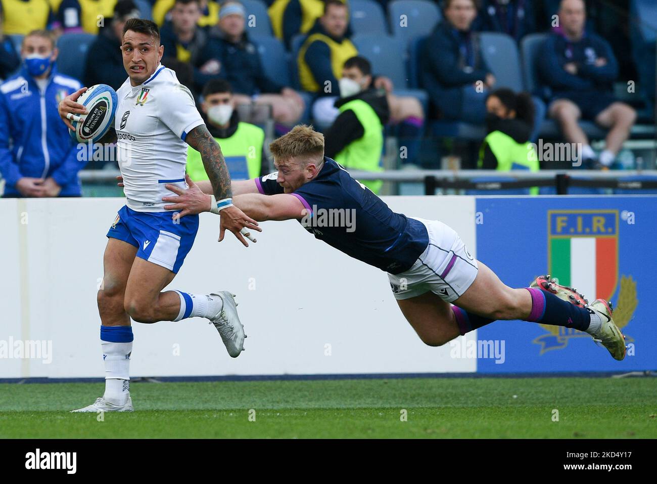 Chris Harris of Scotland and Pierre Bruno of Italy during the Guinness ...