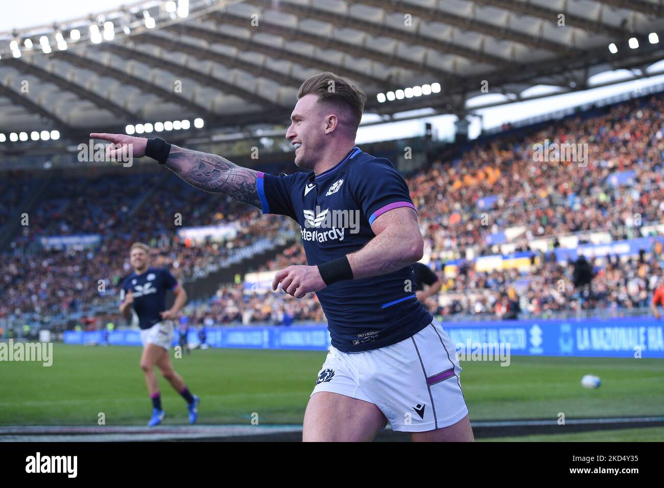 Stuart Hogg of Scotland celebrates scoring a try during the Guinness ...
