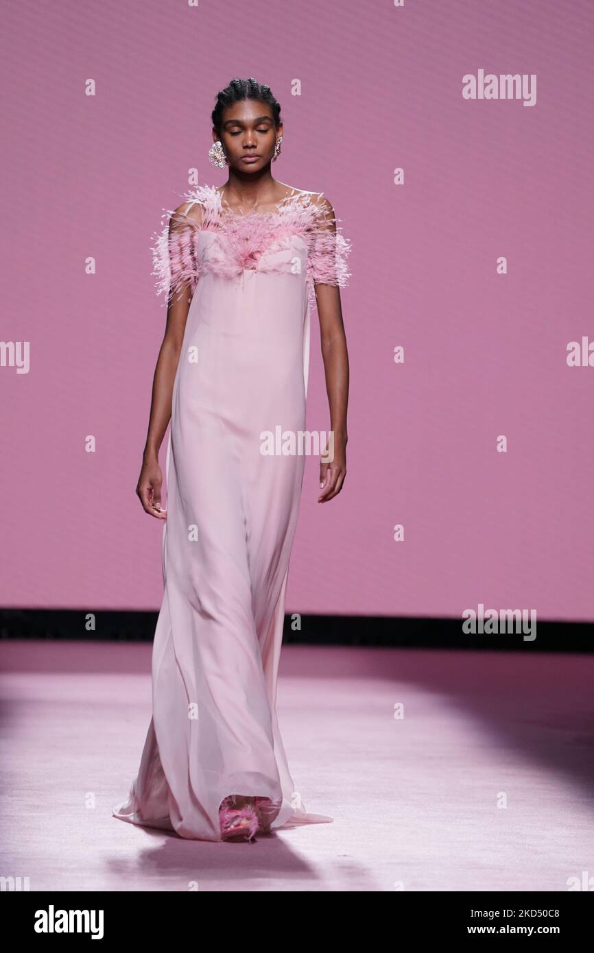 Model walks the runway at the Redondo Brand fashion show during ...