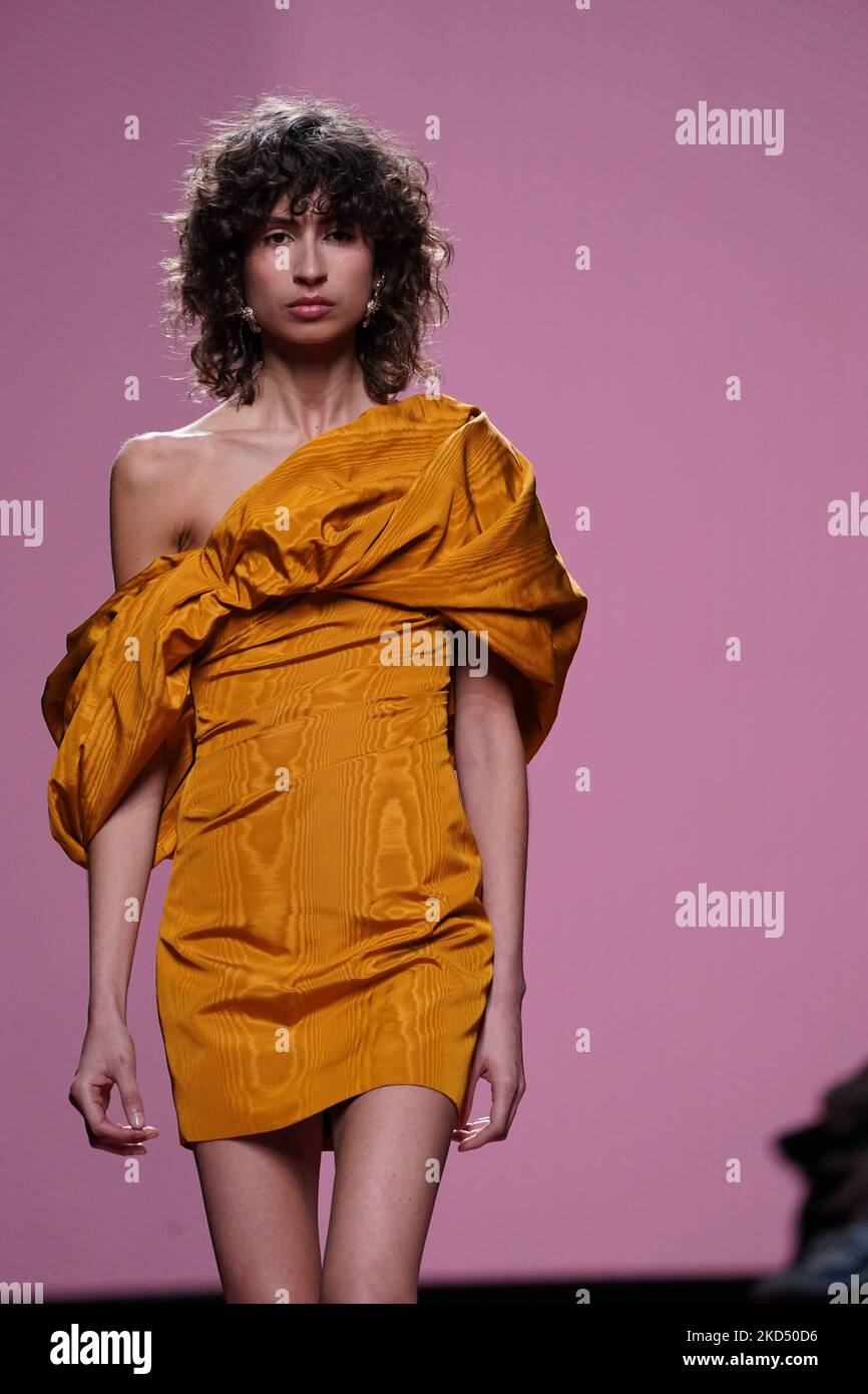 Model walks the runway at the Redondo Brand fashion show during ...