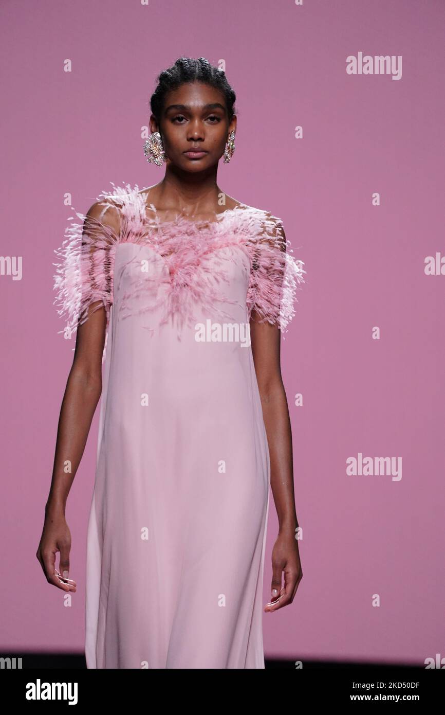 Model walks the runway at the Redondo Brand fashion show during ...