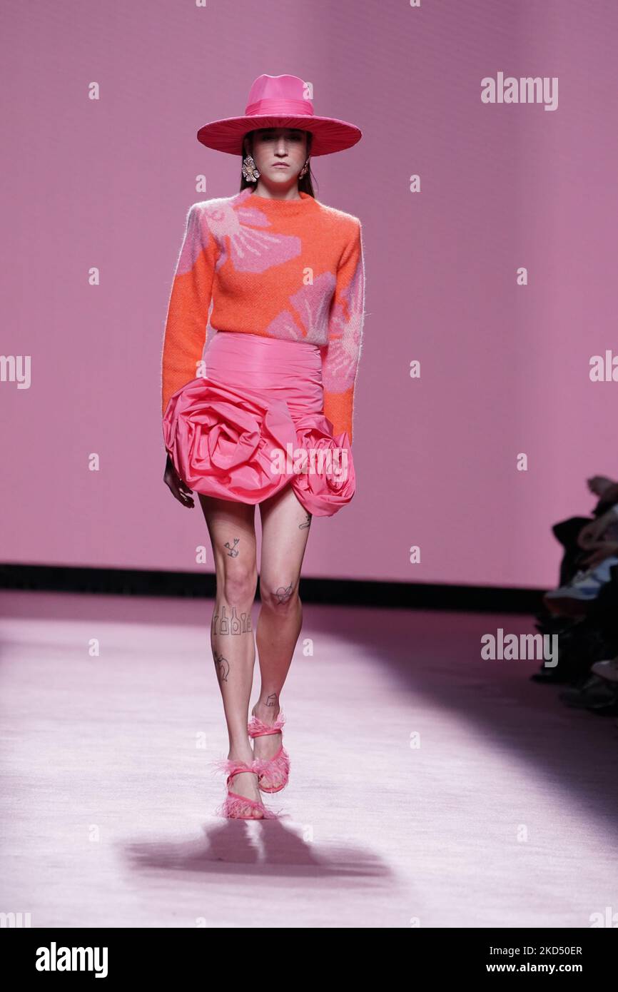 Model walks the runway at the Redondo Brand fashion show during ...