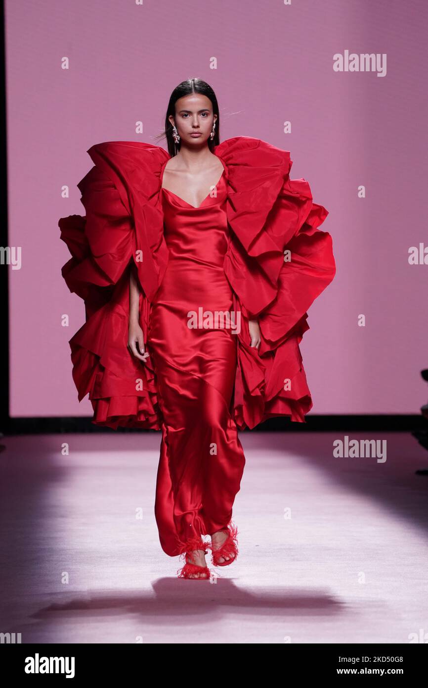 Model walks the runway at the Redondo Brand fashion show during ...