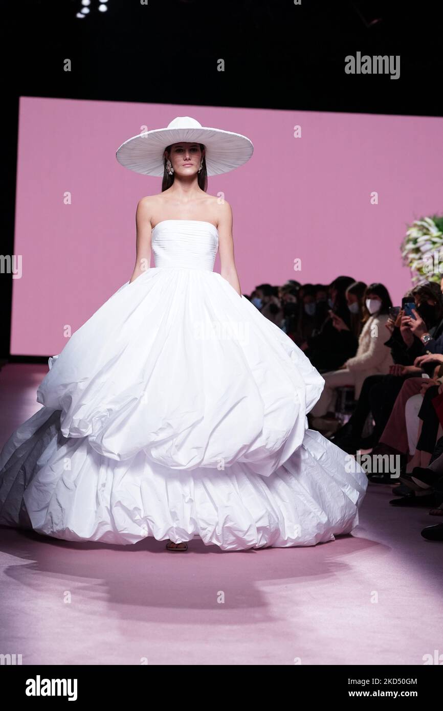 Model walks the runway at the Redondo Brand fashion show during ...