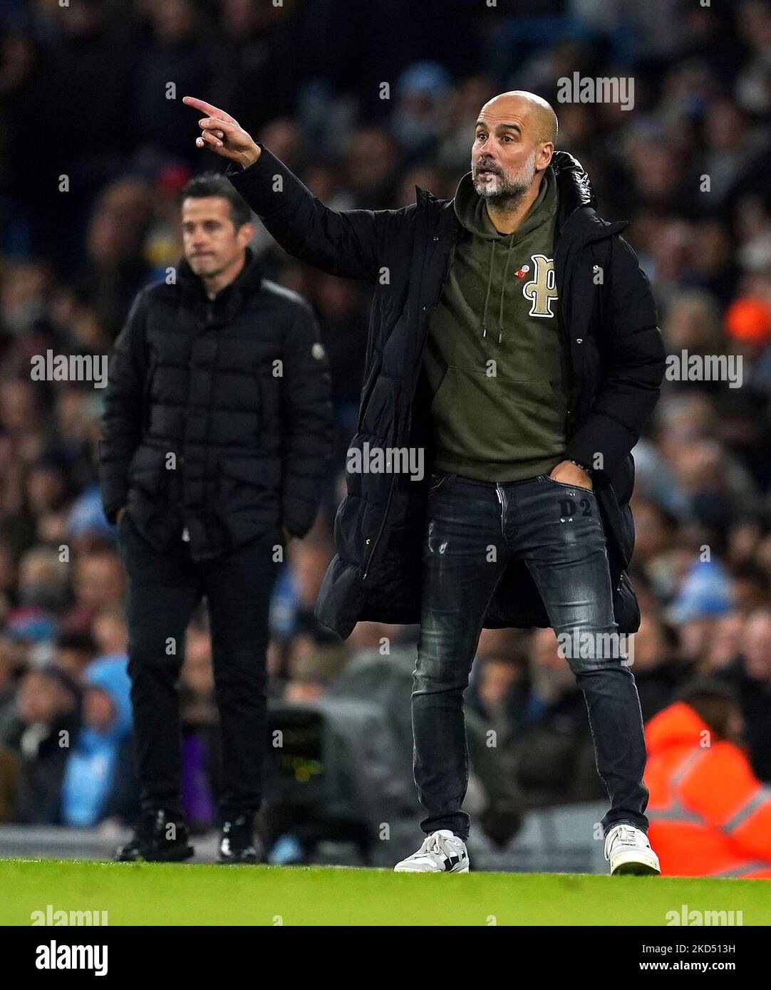 Manchester City manager Pep Guardiola on the touchline instructs his ...