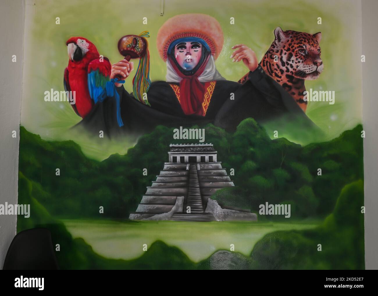 A mural on the wall showing symbols related to Chiapas, seen in San ...