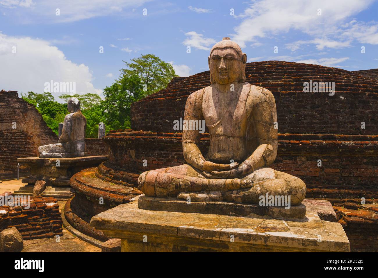 The ancient stone Buddha on the upper platform in the Vatadage Stock ...