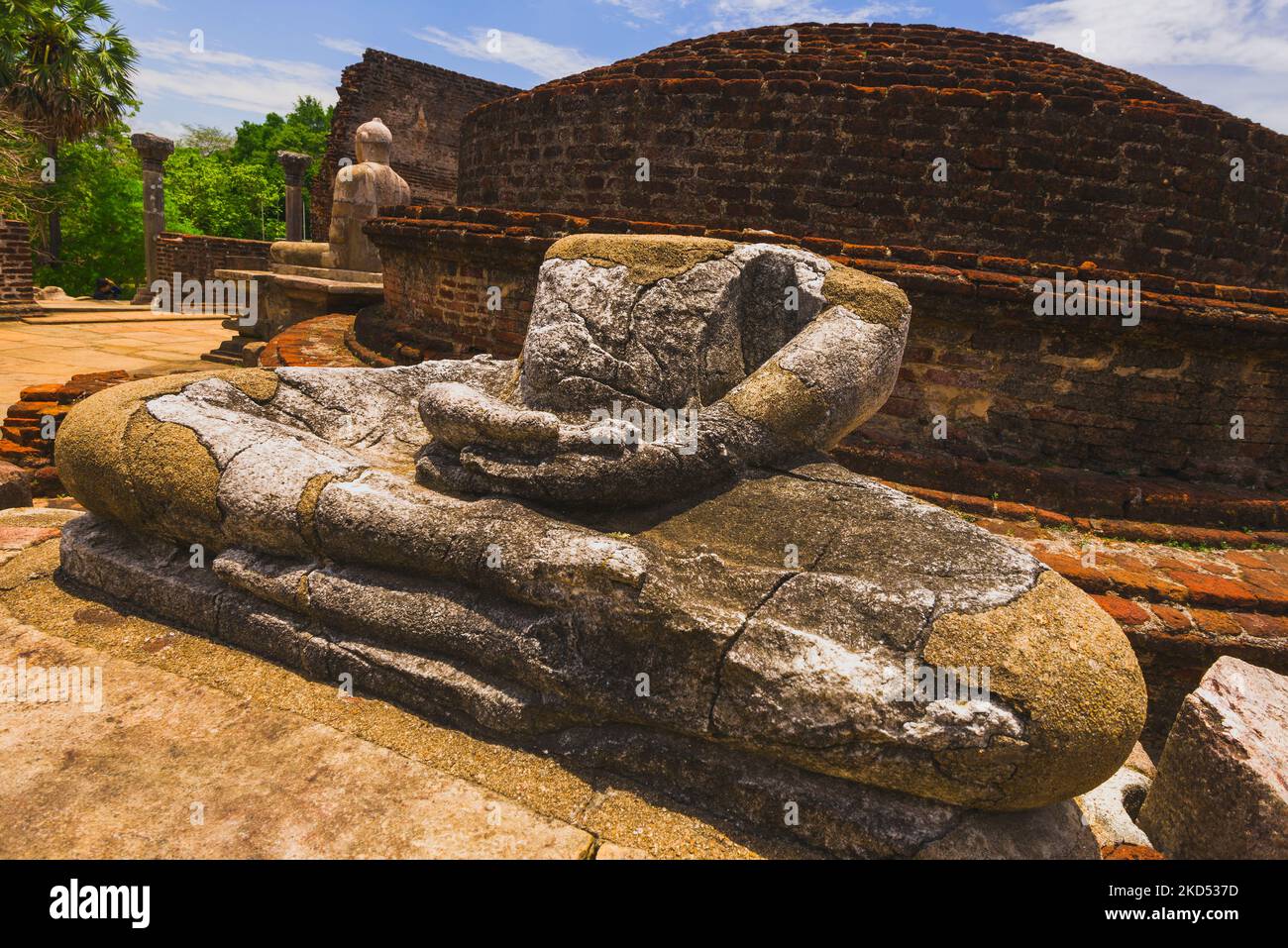 The ancient stone Buddha on the upper platform in the Vatadage Stock ...