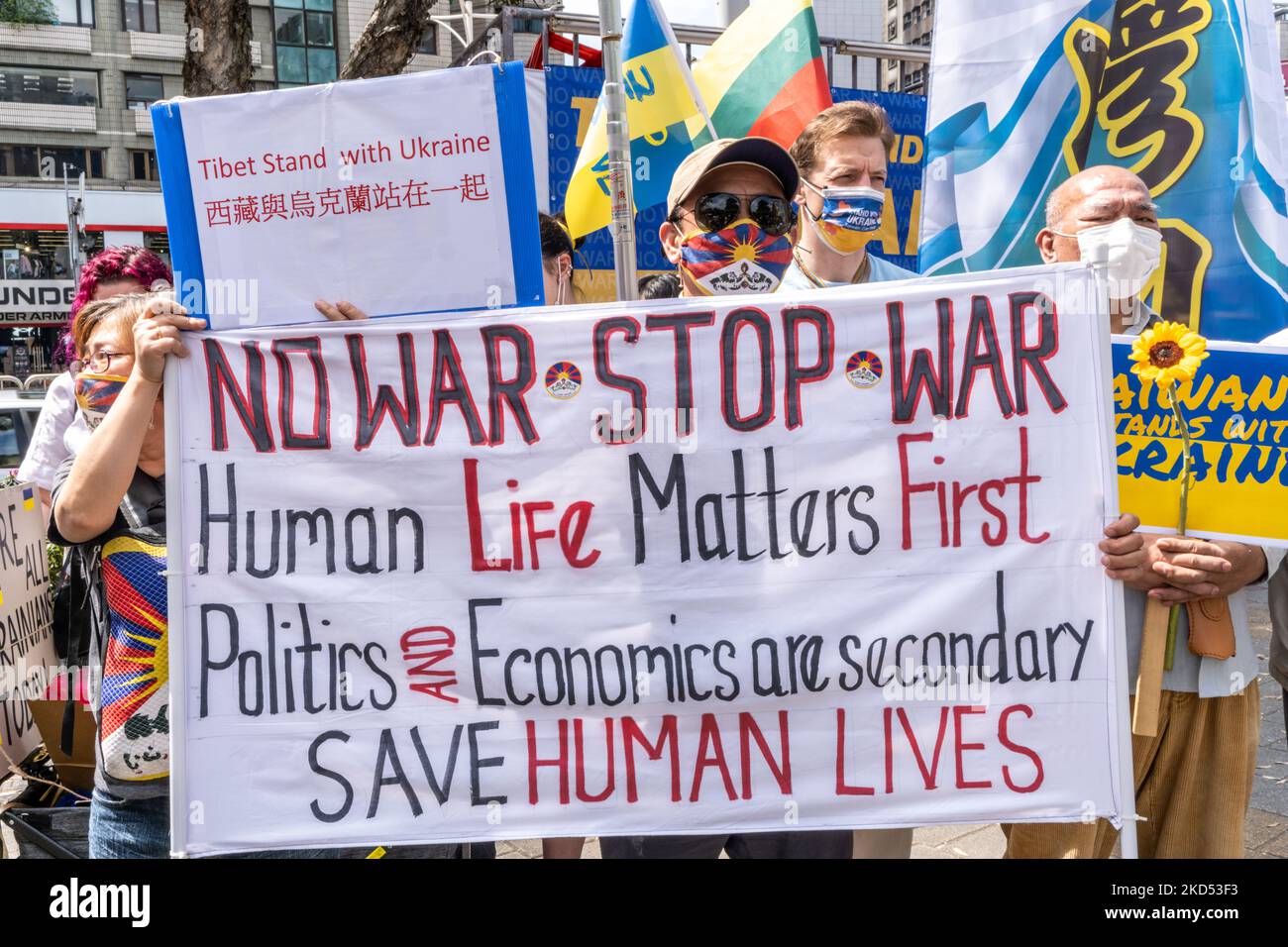 Big White banner reading NO WAR STOP WAR, HUMAN LIFE MATTERS FIRST ...