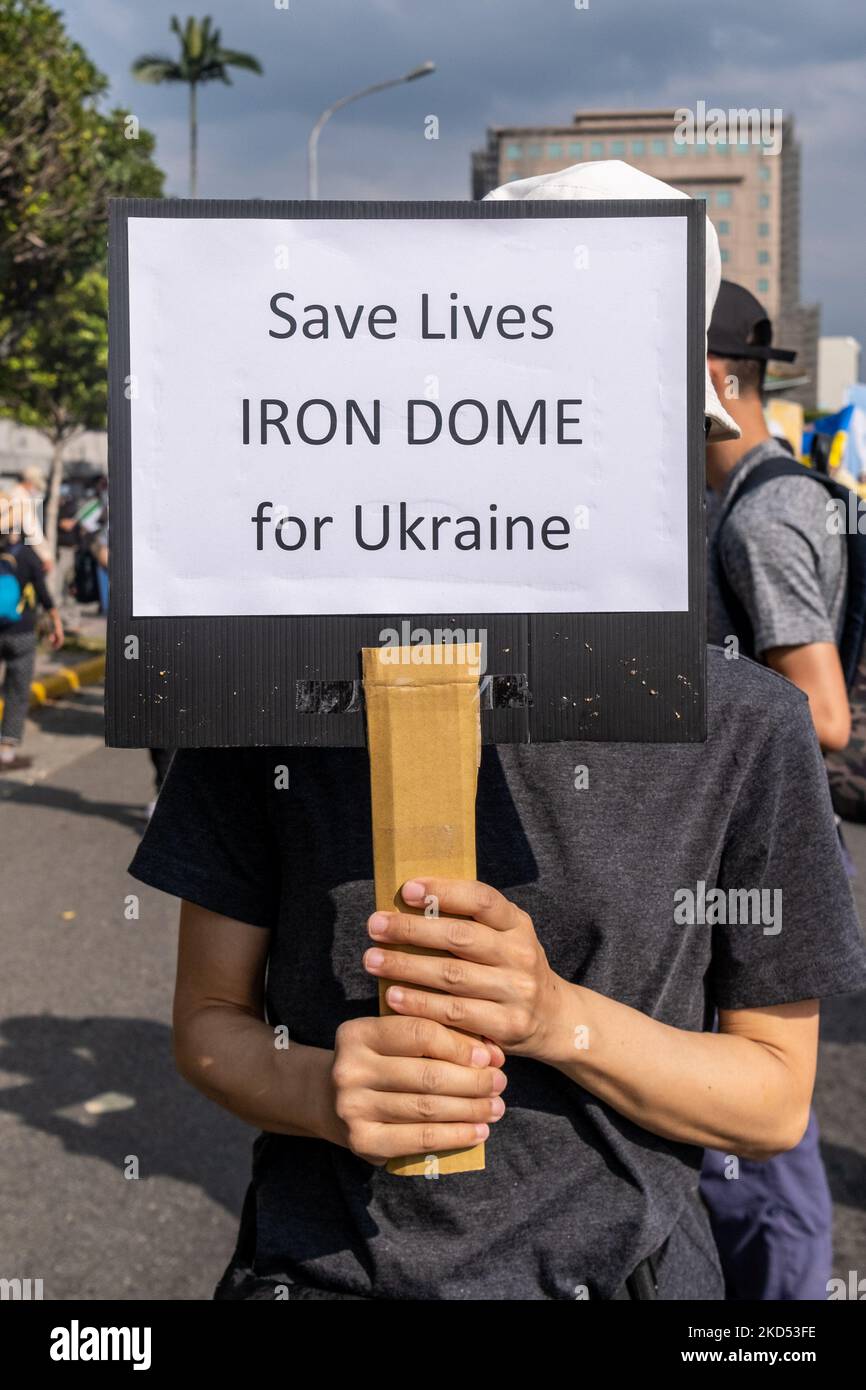 A sign reading "Save Lives Iron Dome for Ukraine". Taipei, Taiwan ...