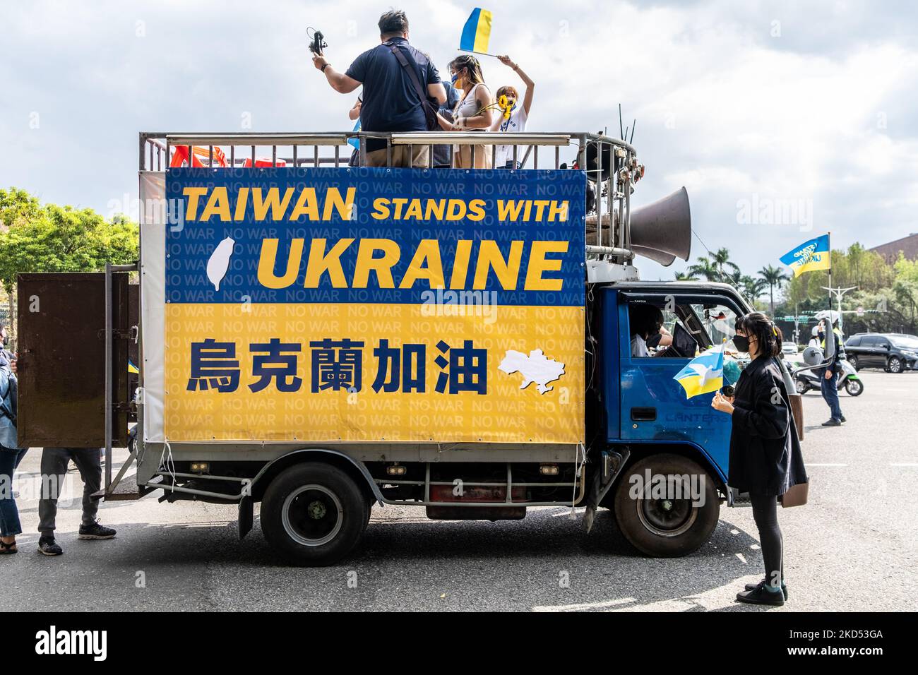 Truck with a big Banner reading Taiwan stands with Ukraine. Taipei ...