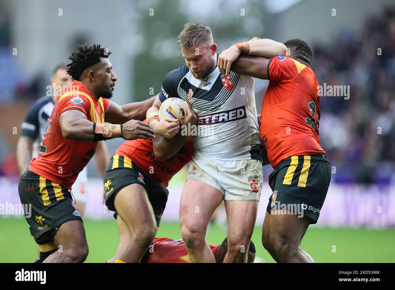 WIGAN, UK: Mike Cooper of England gets tackled during the 2021 Rugby ...