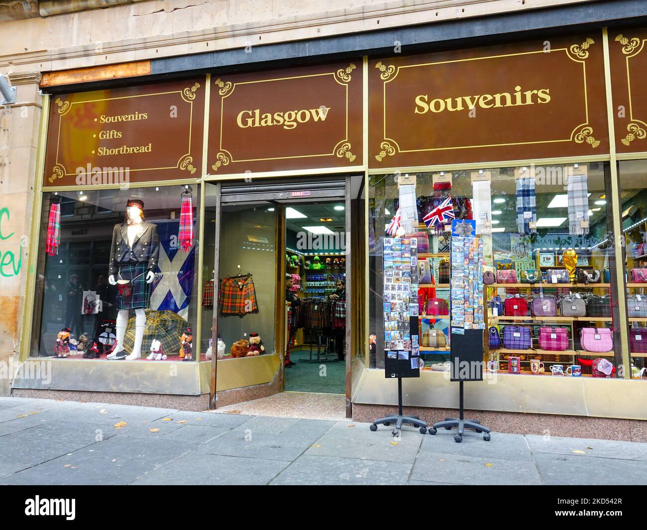Souvenir shop advertising kilts, plaid items, and shortbread, Glasgow ...