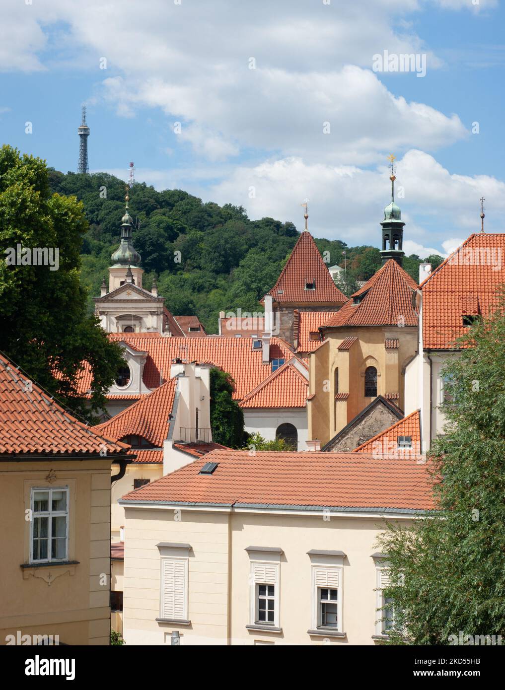 Buildings with red tile roofs. Spires of churches. Old Town Square ...