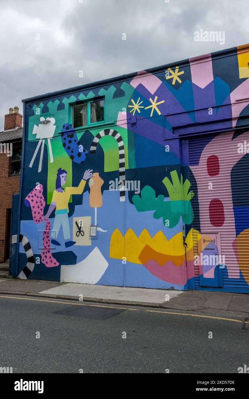 A view of a building wall with colorful art in the center of Dublin ...