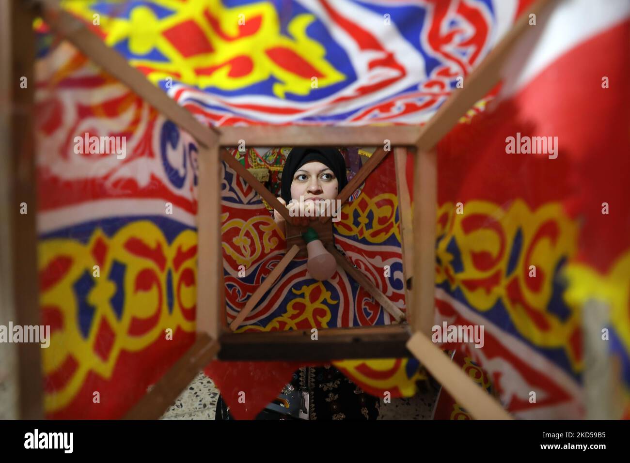Palestinian woman Reham Shurab makes a traditional lantern, called a ...