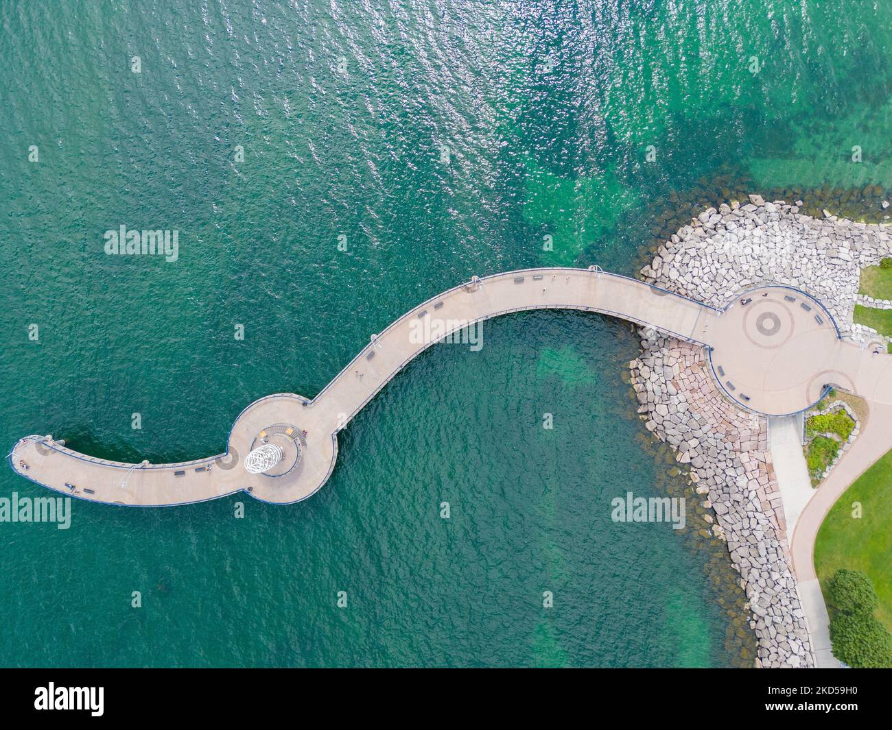 A top view of the Brant Street Pier on the rocky shore of Lake Ontario ...