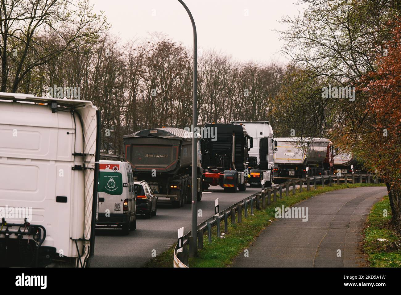 truckers are seen driving away during the demonstration due to the ...