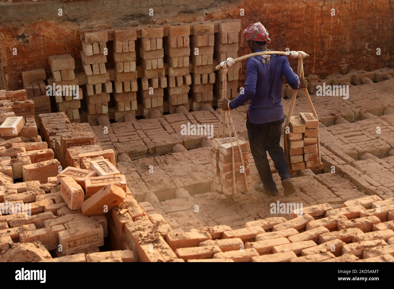 Seasonal Migrant workers during work at a brick-making field in Dhaka ...