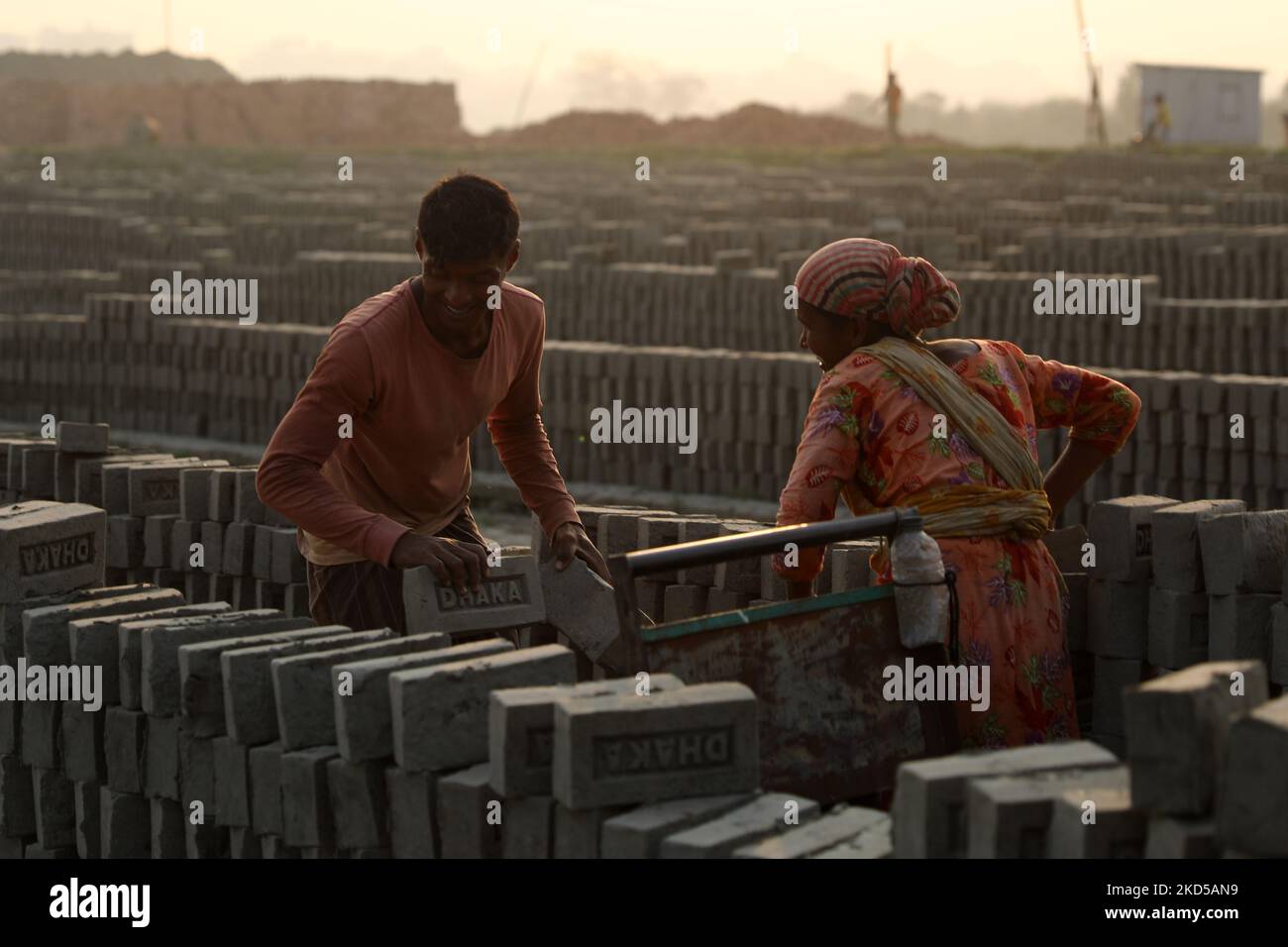 Seasonal Migrant workers during work at a brick-making field in Dhaka ...