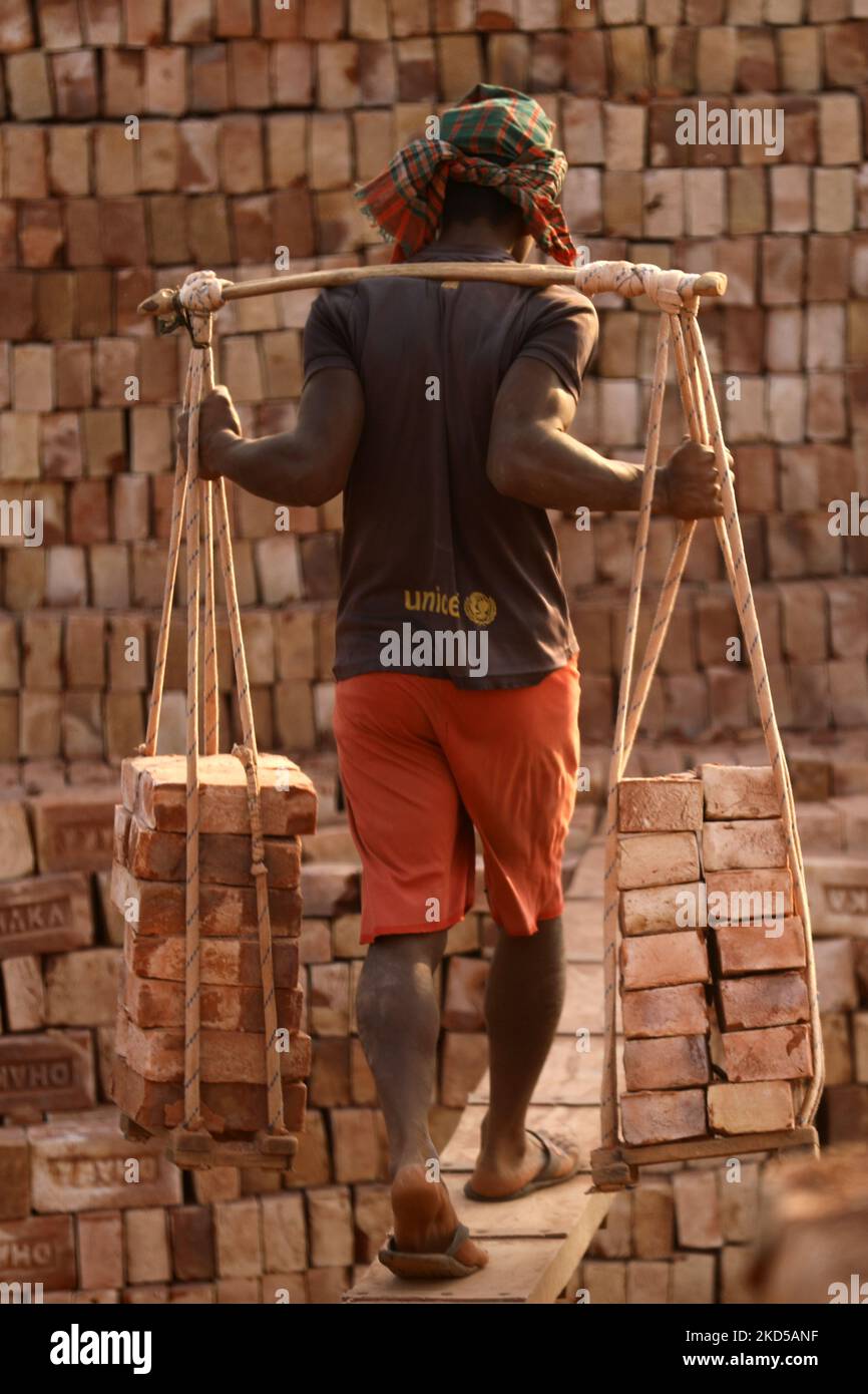 Seasonal Migrant workers during work at a brick-making field in Dhaka ...
