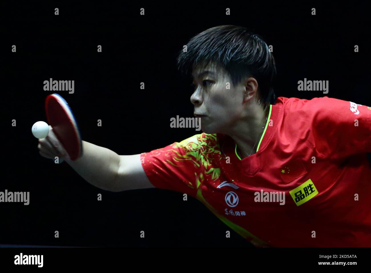 Wang Yidi of China plays a shot against Yuan Jia Nan of France during ...