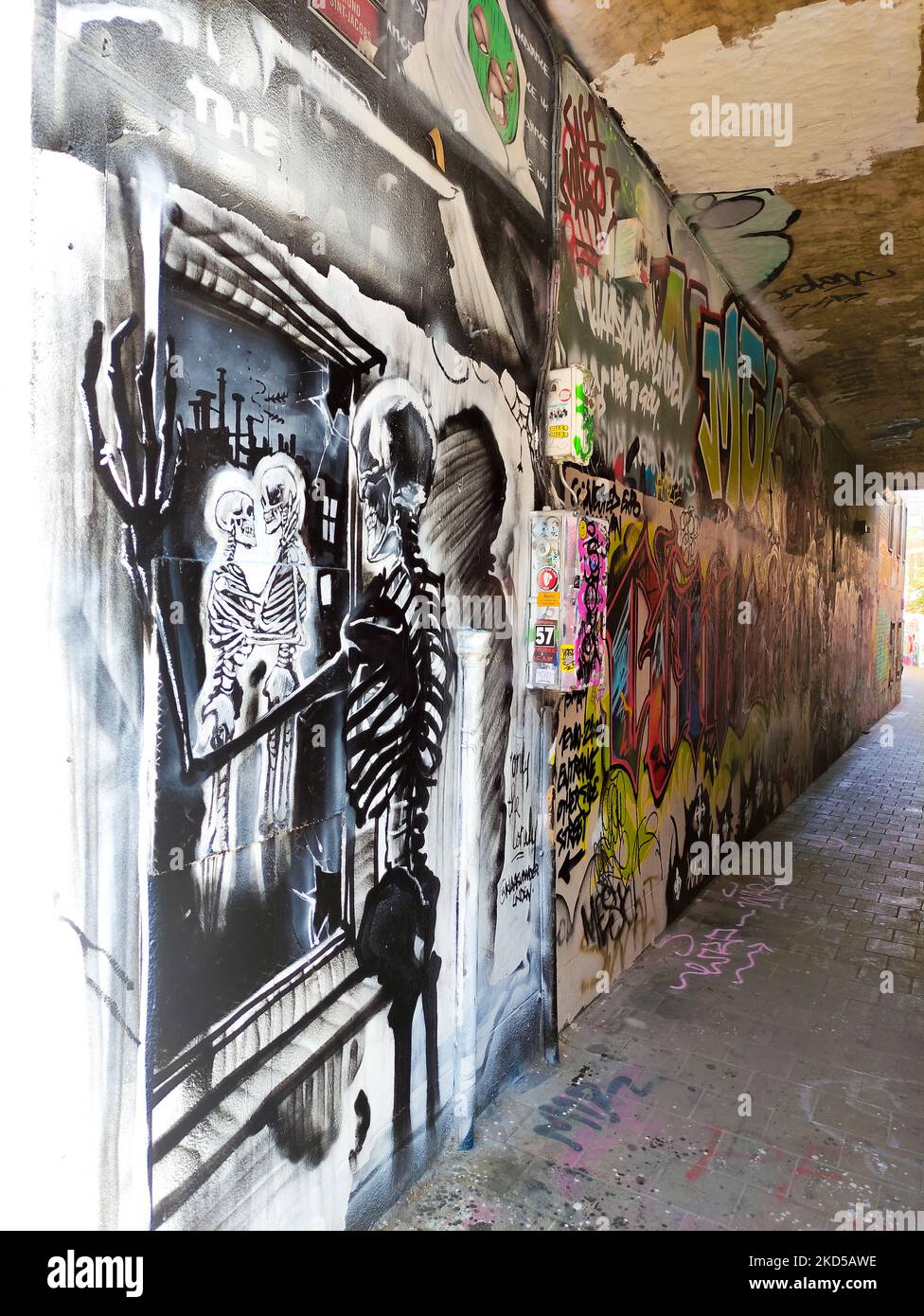 Graffiti street in Gent, Belgium with skeleton draw Stock Photo - Alamy